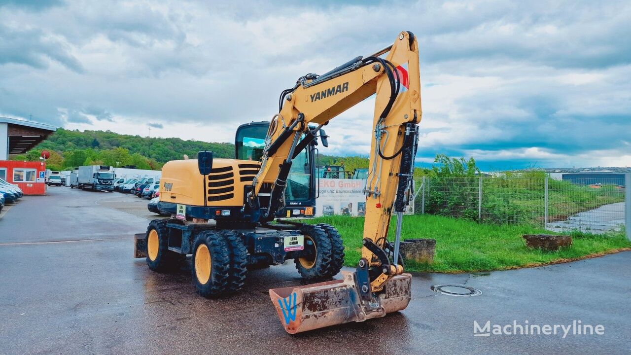 Yanmar B 95W Mit Drei Löffeln und Ein Hammer bager točkaš