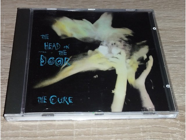 The Cure - The Head On The Door