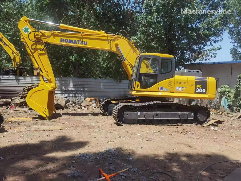 Komatsu PC300 bager guseničar