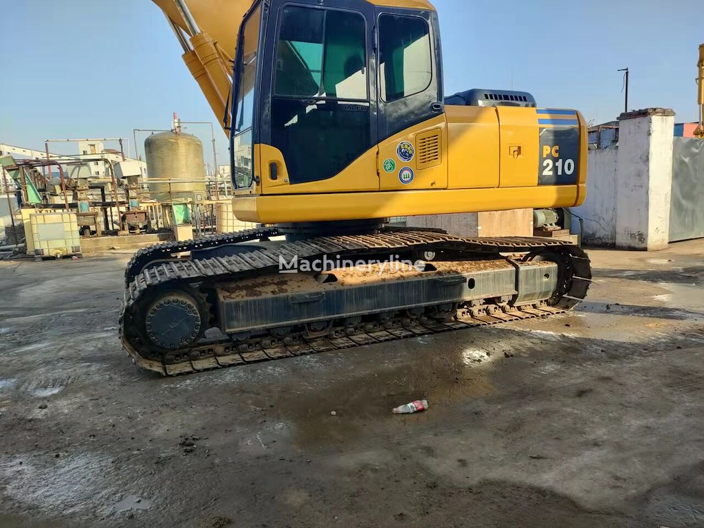 Komatsu PC210 bager guseničar