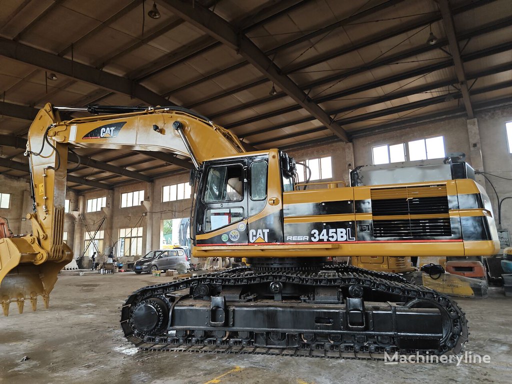 Caterpillar used 345BL heavy machine bager guseničar