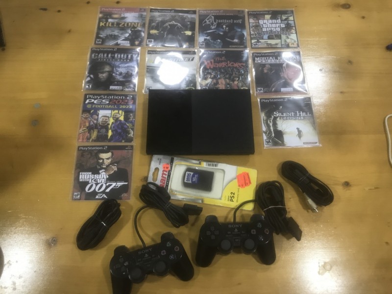 Sony Playstation 2 slim + 11 igrica