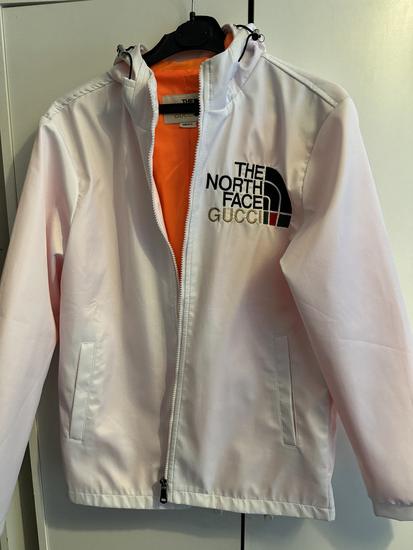 north face gucci prolecna jakna