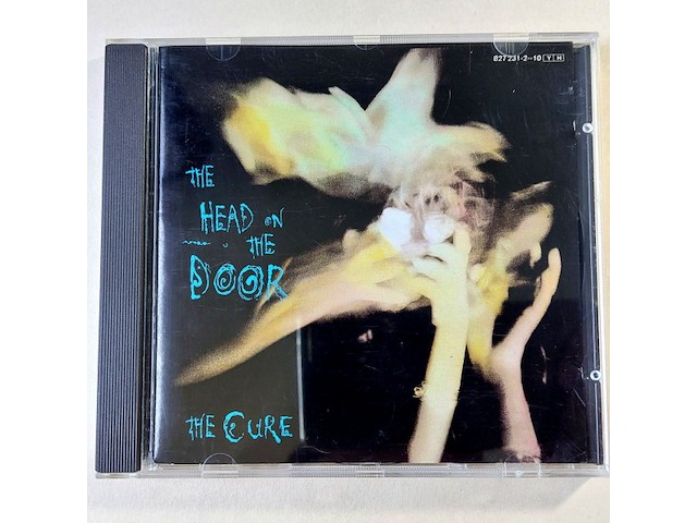 The Cure - The Head On The Door