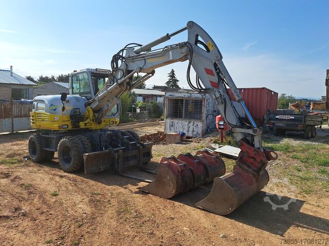 Mobilni bager
Takeuchi TB 295 W with 4 buckets and palletfork