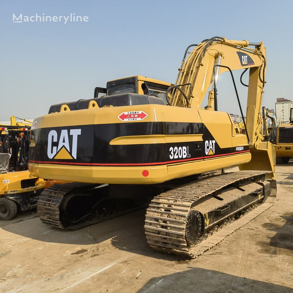 Caterpillar 320BL bager guseničar