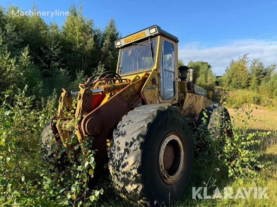 Prodaje se HANOMAG CL66 bager-utovarivač na aukciji