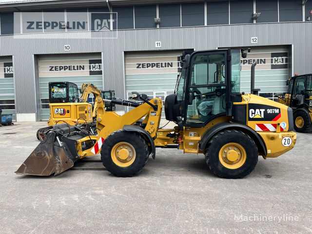 Caterpillar 907M teleskopski prednji utovarivač