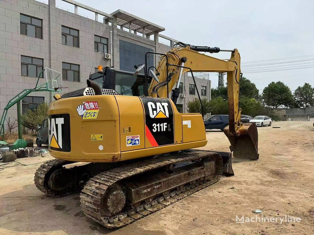 Caterpillar 311F original bager guseničar