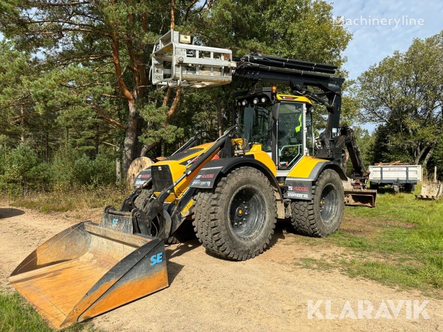 Prodaje se Huddig 1260C Cable bager-utovarivač na aukciji