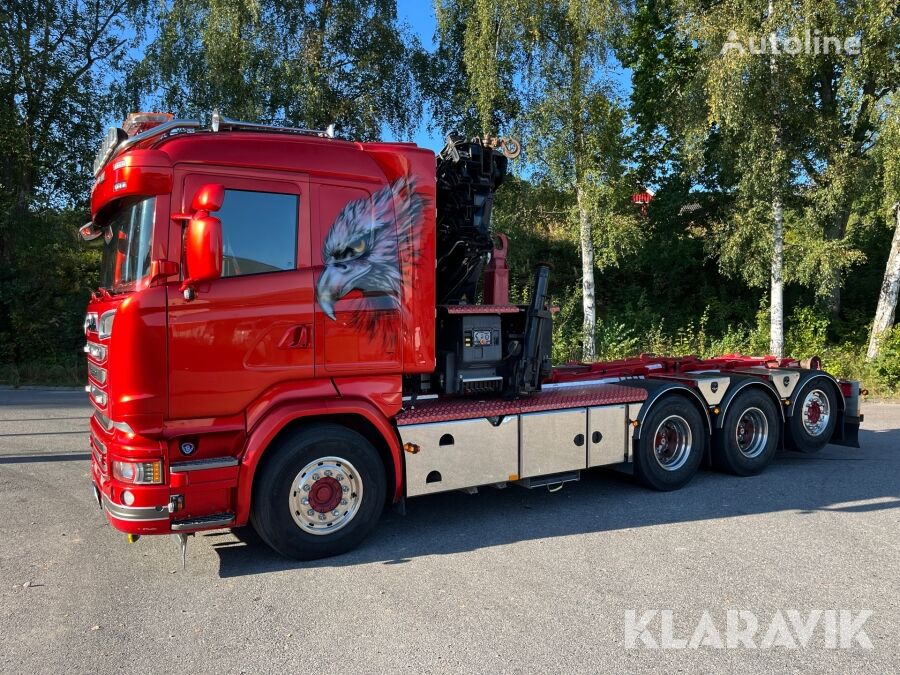 Prodaje se Scania R580 rol kiper sa kukom na aukciji