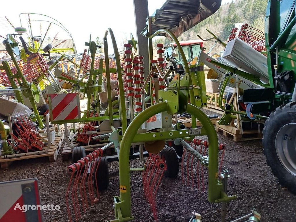 Claas liner 370 prevrtač sena