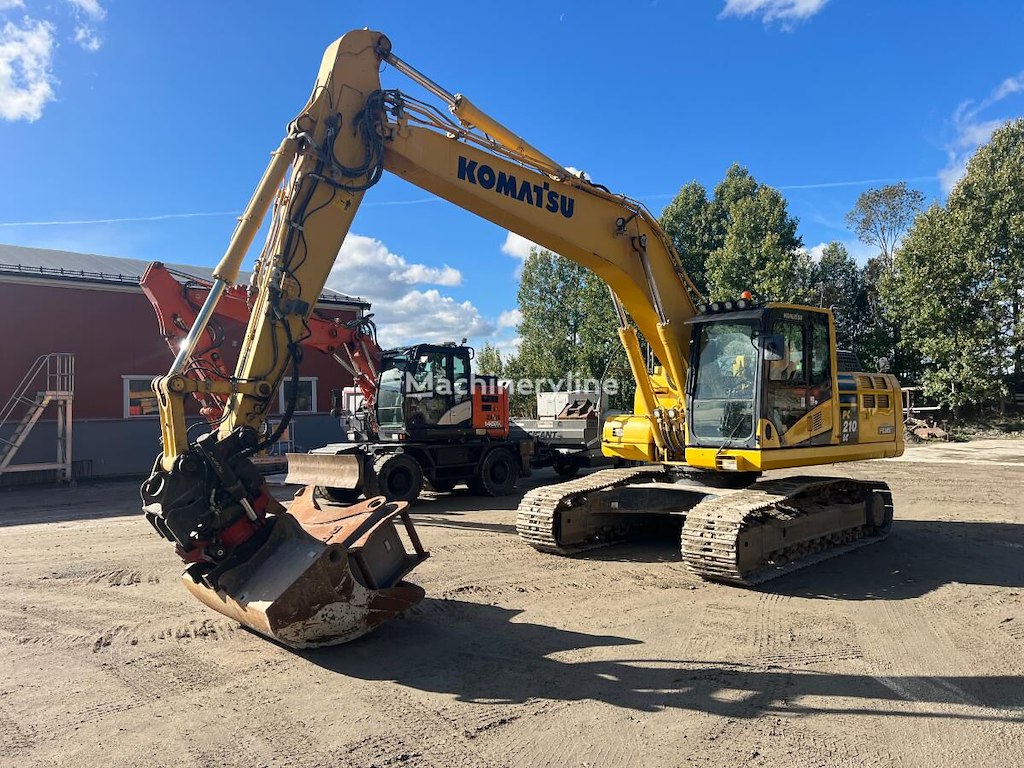 Prodaje se Komatsu PC210LC BELTEGRAVER ROTORTILT 2 SKUFFER SENTRALSMØRING bager guseničar na aukciji