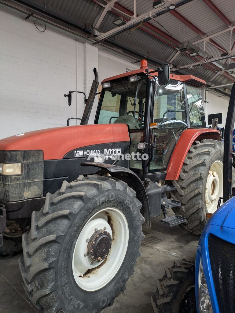 New Holland M115 traktor točkaš