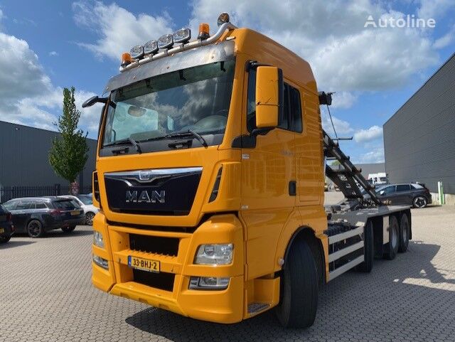 MAN TGX 38 520 8X4/4 CONTAINER TRANSPORT EURO 6 kamion sa kukom za podizanje tereta