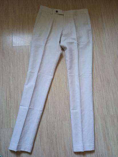 Elegantne pantalone u boji peska 36