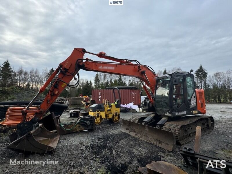 Hitachi ZX135US bager guseničar