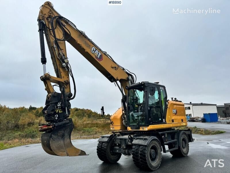 Caterpillar M318 bager točkaš