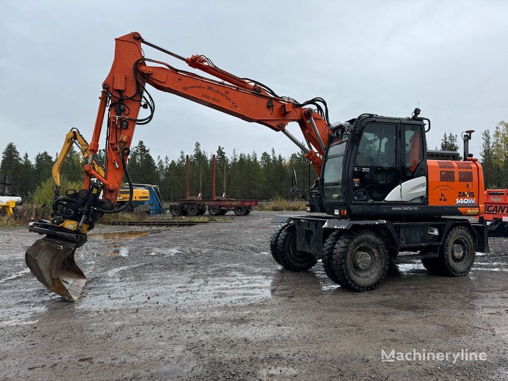 Prodaje se Hitachi ZX140W-6 bager točkaš na aukciji