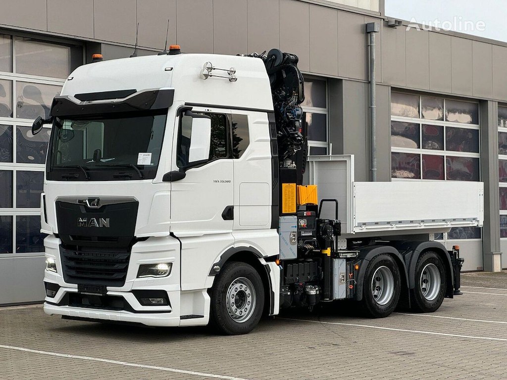 Novi MAN TGX 33.580 SZM / Seilwinde kamion s ravnom platformom