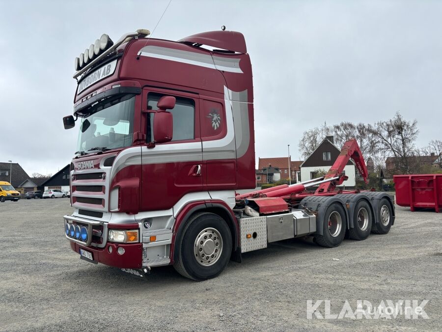 Prodaje se Scania R560 V8 rol kiper sa kukom na aukciji