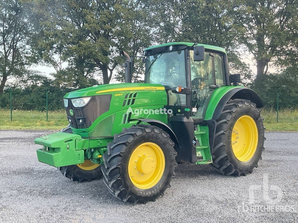 Prodaje se John Deere 6135M traktor točkaš na aukciji