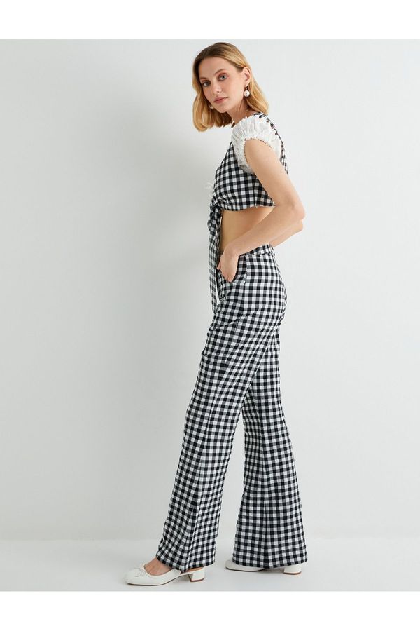 KOTON X TUBA ÜNSAL - GINGHAM CHECK FLARE TROUSERS WITH POCKETS SLIM FIT