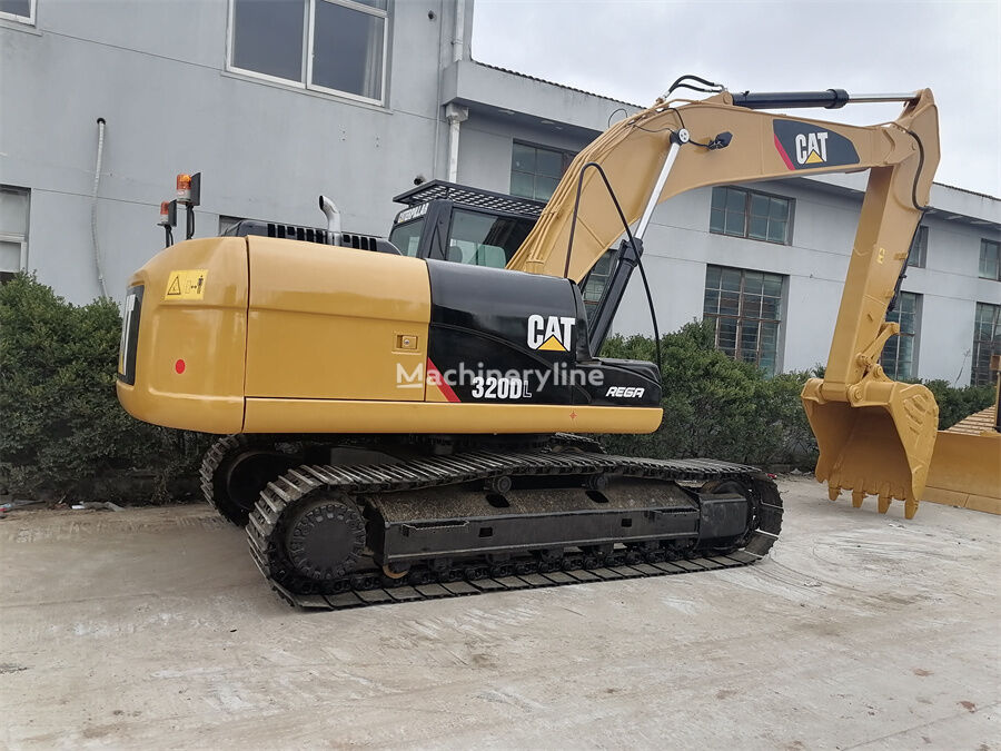 Caterpillar 320DL bager guseničar