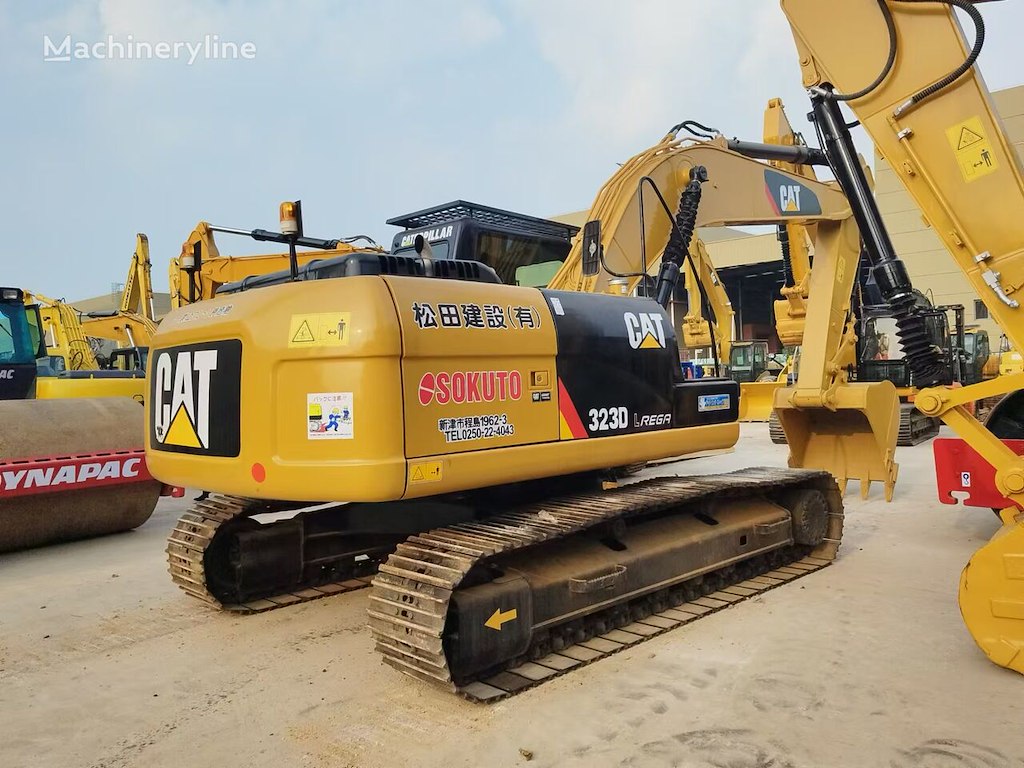 Caterpillar 323DL bager guseničar