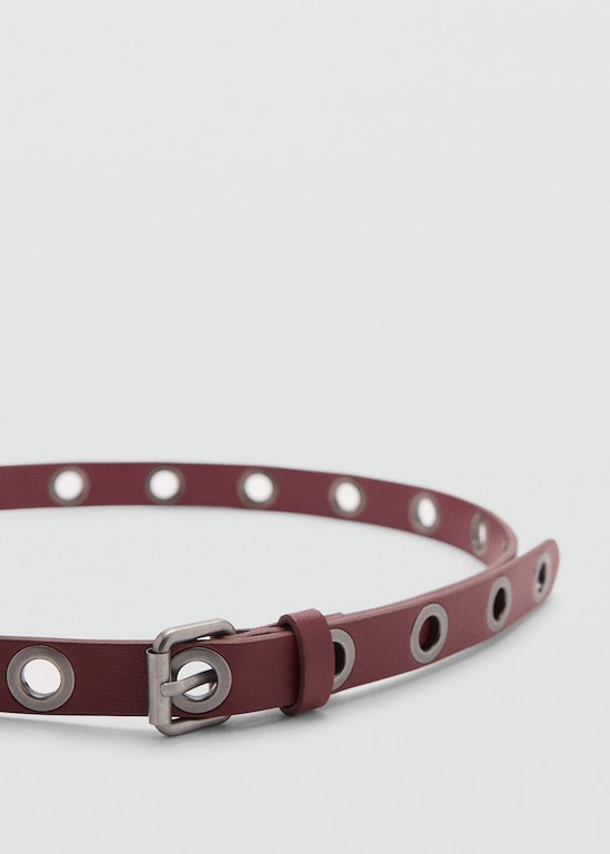 Belt with metal eyelets