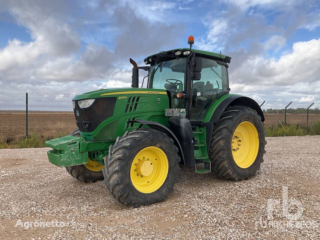 Prodaje se John Deere 6215R traktor točkaš na aukciji