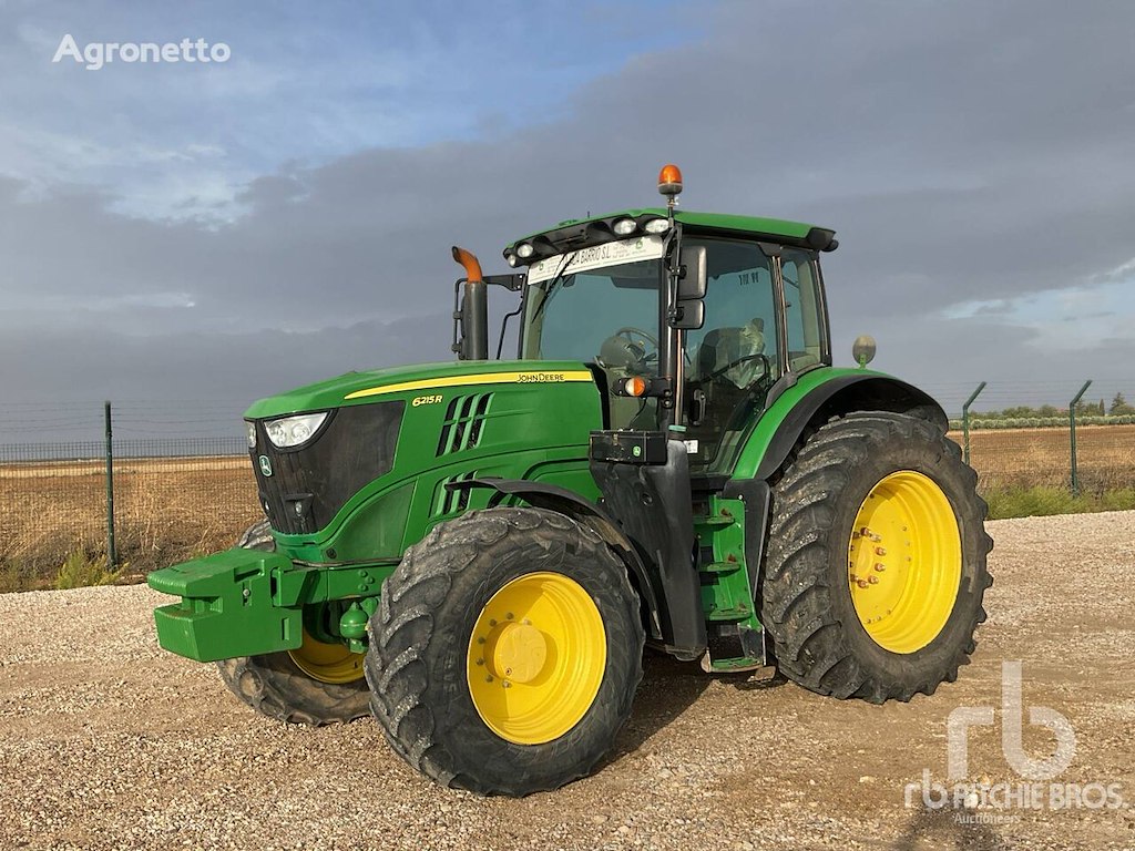 Prodaje se John Deere 6215R traktor točkaš na aukciji