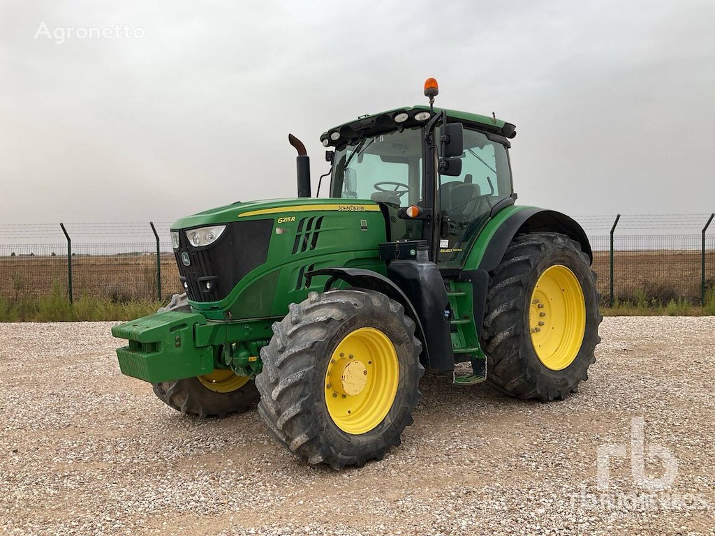 Prodaje se John Deere 6215R traktor točkaš na aukciji