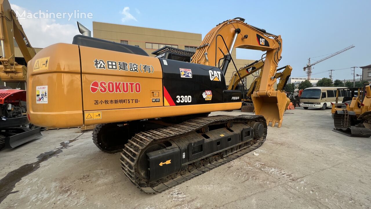 Caterpillar 330D in stock bager guseničar