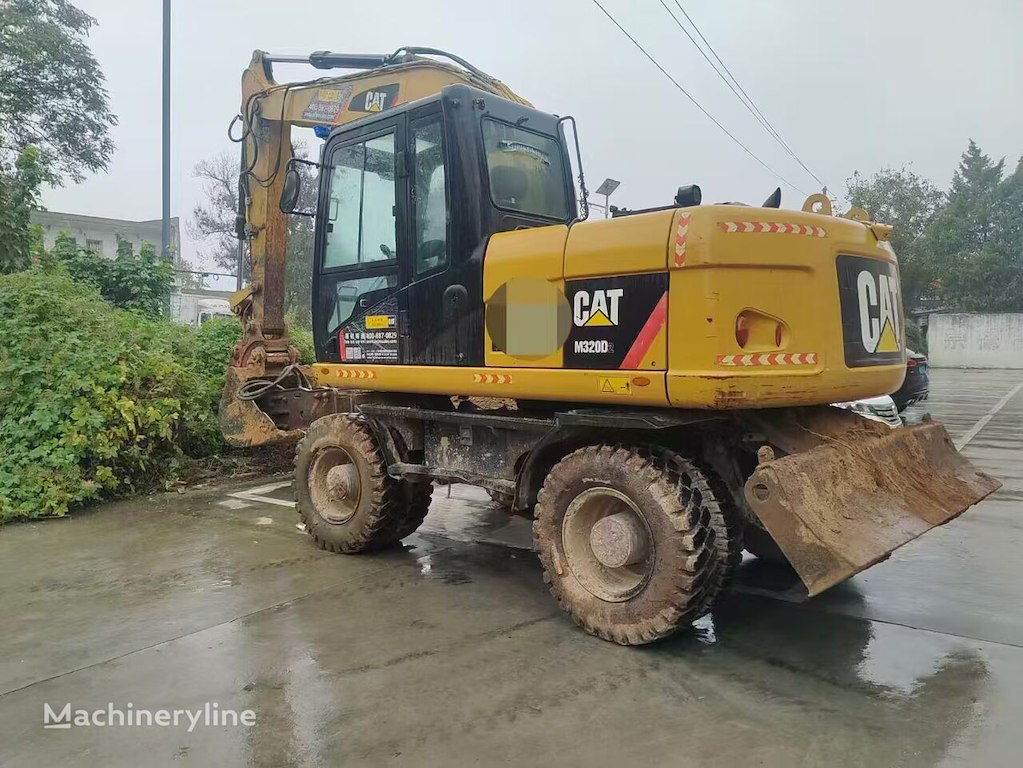 Caterpillar M320D2 bager točkaš