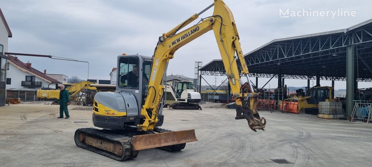 New Holland E50 2C mini bager