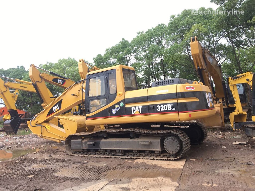 Caterpillar 320BL bager guseničar