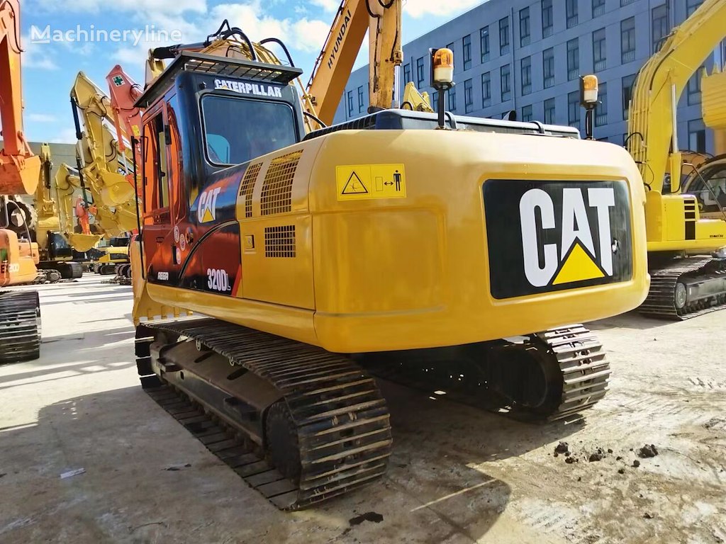 Caterpillar 320DL bager guseničar