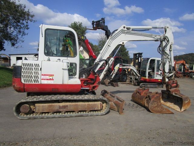 Mini bageri
Takeuchi TB 145 - Martin-Powertilt + hydr. Schnellwechsler