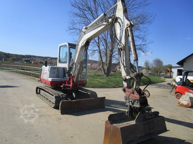 Mini bageri
Takeuchi TB 145 - hydr. Schnellwechsler + 4 Löffel