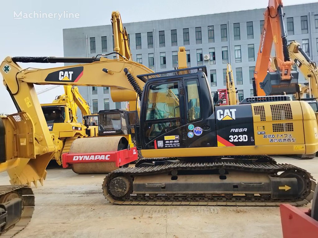 Caterpillar 323BL bager guseničar