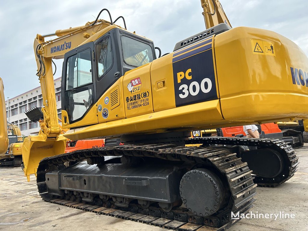 Komatsu PC300 bager guseničar