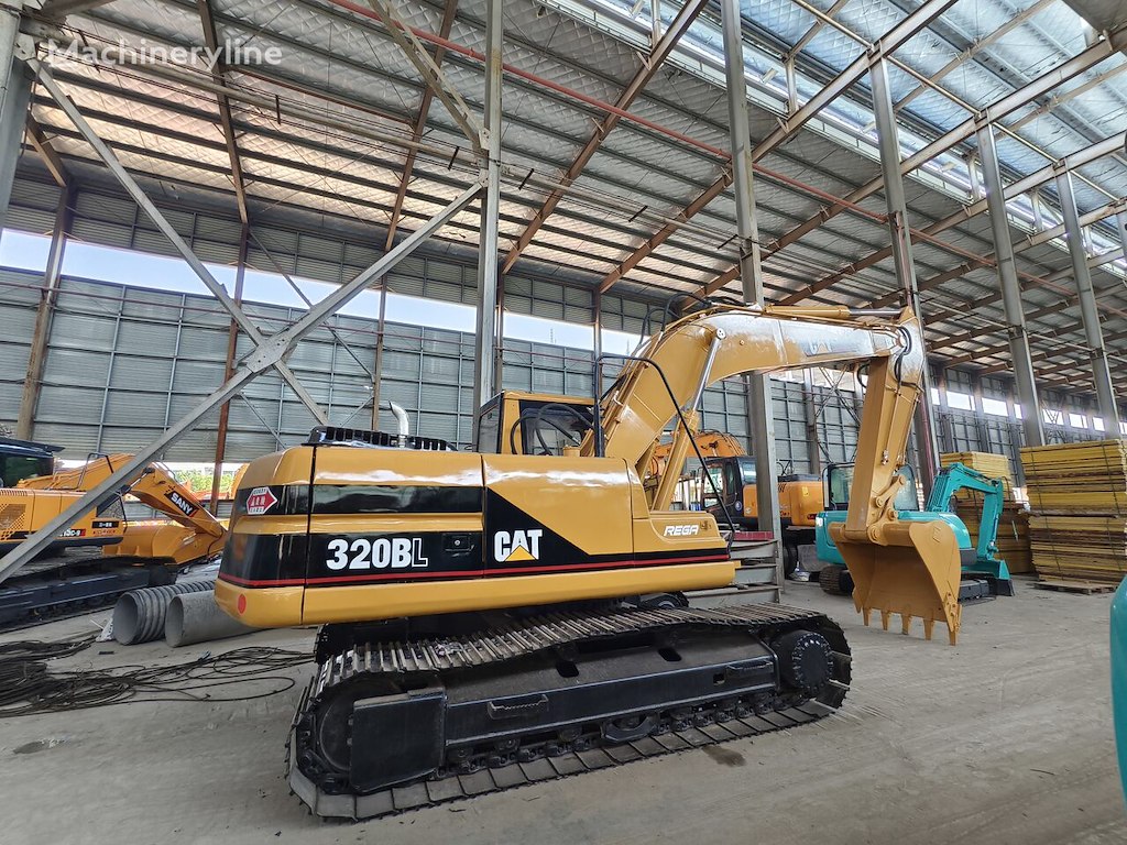 Caterpillar 320BL bager guseničar