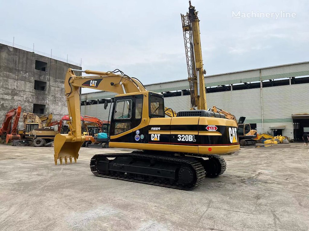 Caterpillar 320BL bager guseničar