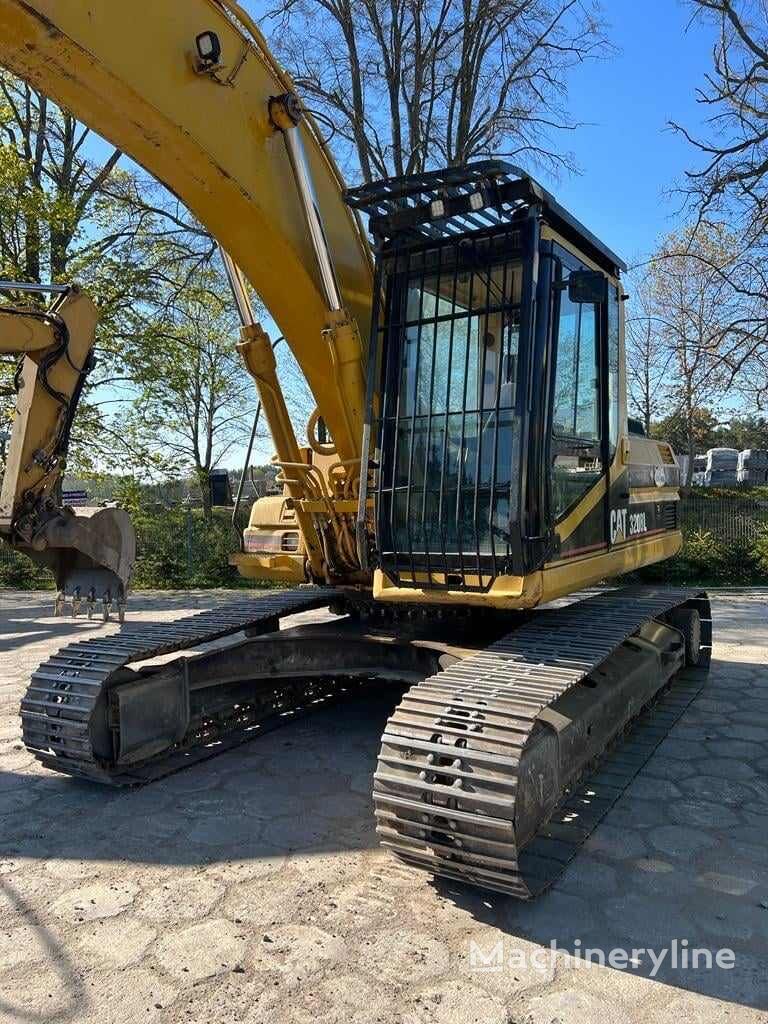 Caterpillar 320 BL bager guseničar