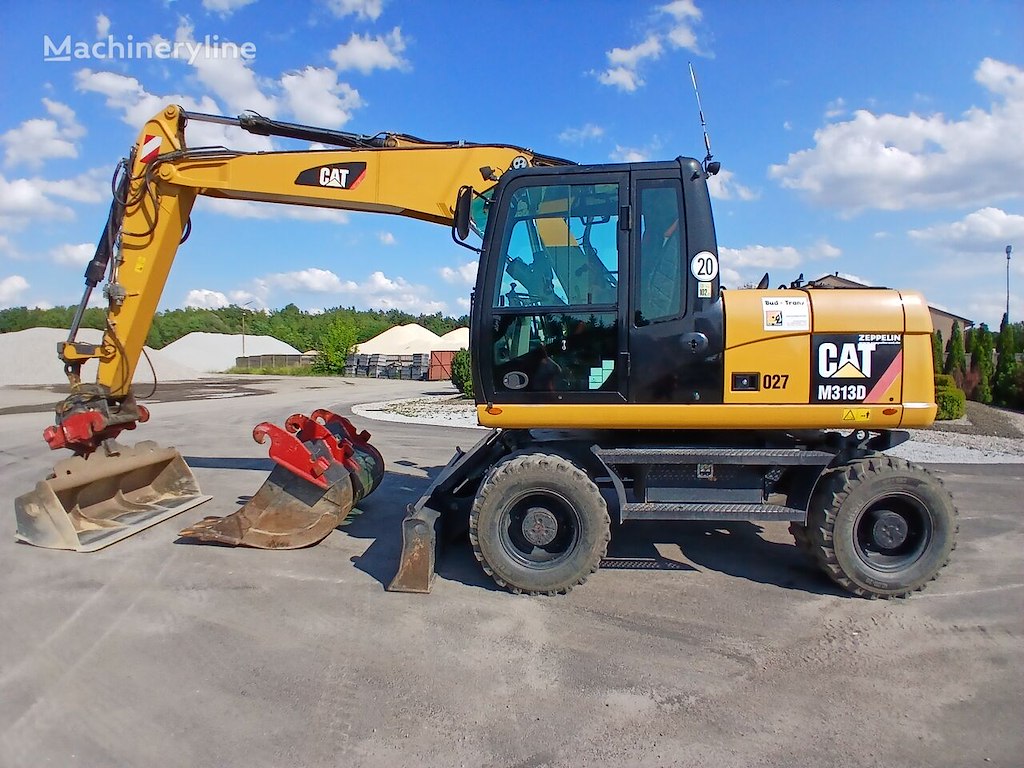 Caterpillar M313D bager točkaš