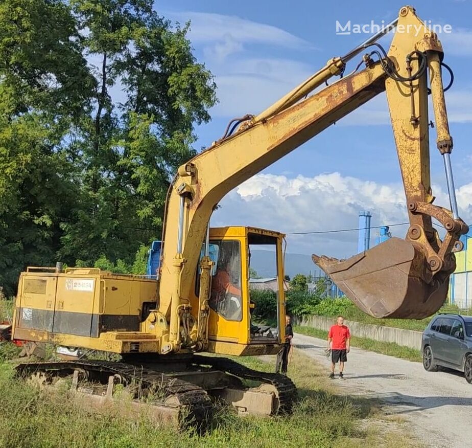 Caterpillar 215 B SA bager guseničar