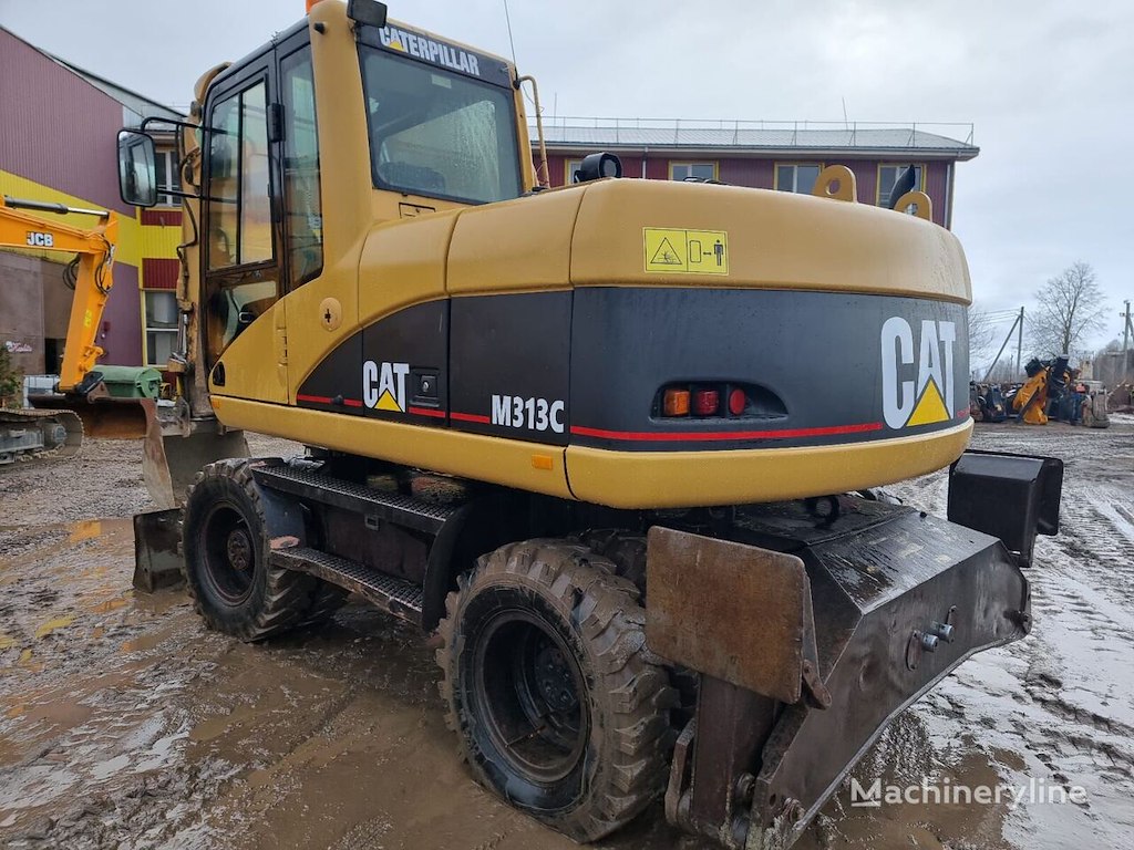 Caterpillar M313C bager točkaš