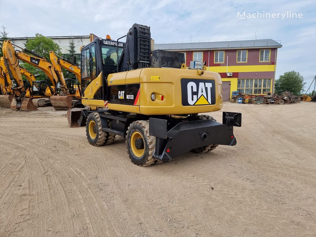 Caterpillar M313D bager točkaš