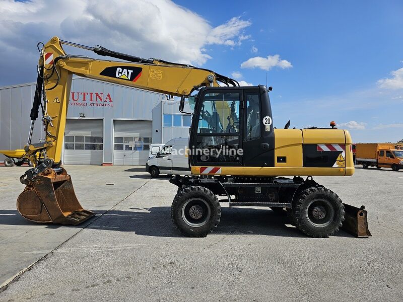 Caterpillar M315D bager točkaš